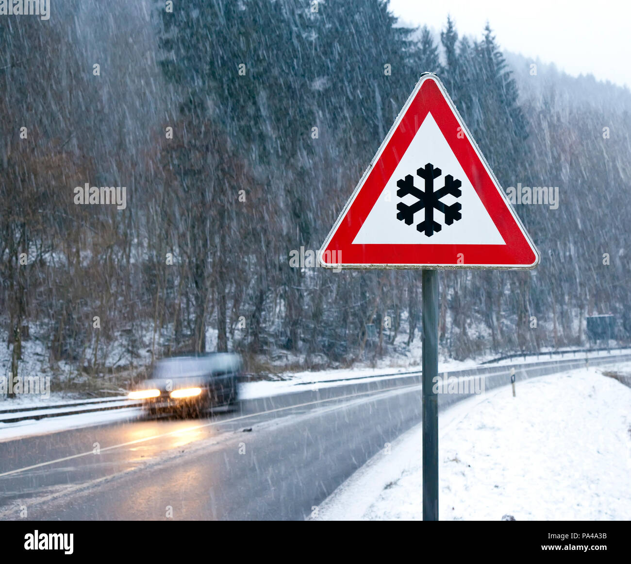 A photography of a snow street sign Stock Photo - Alamy