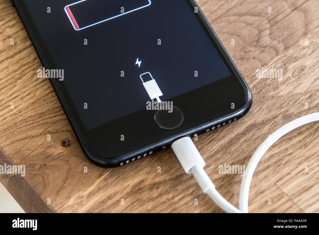 Charged iphone hi-res stock photography and images - Alamy