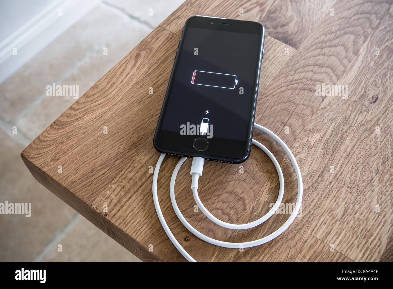 Mobile phone with low battery Stock Photo - Alamy