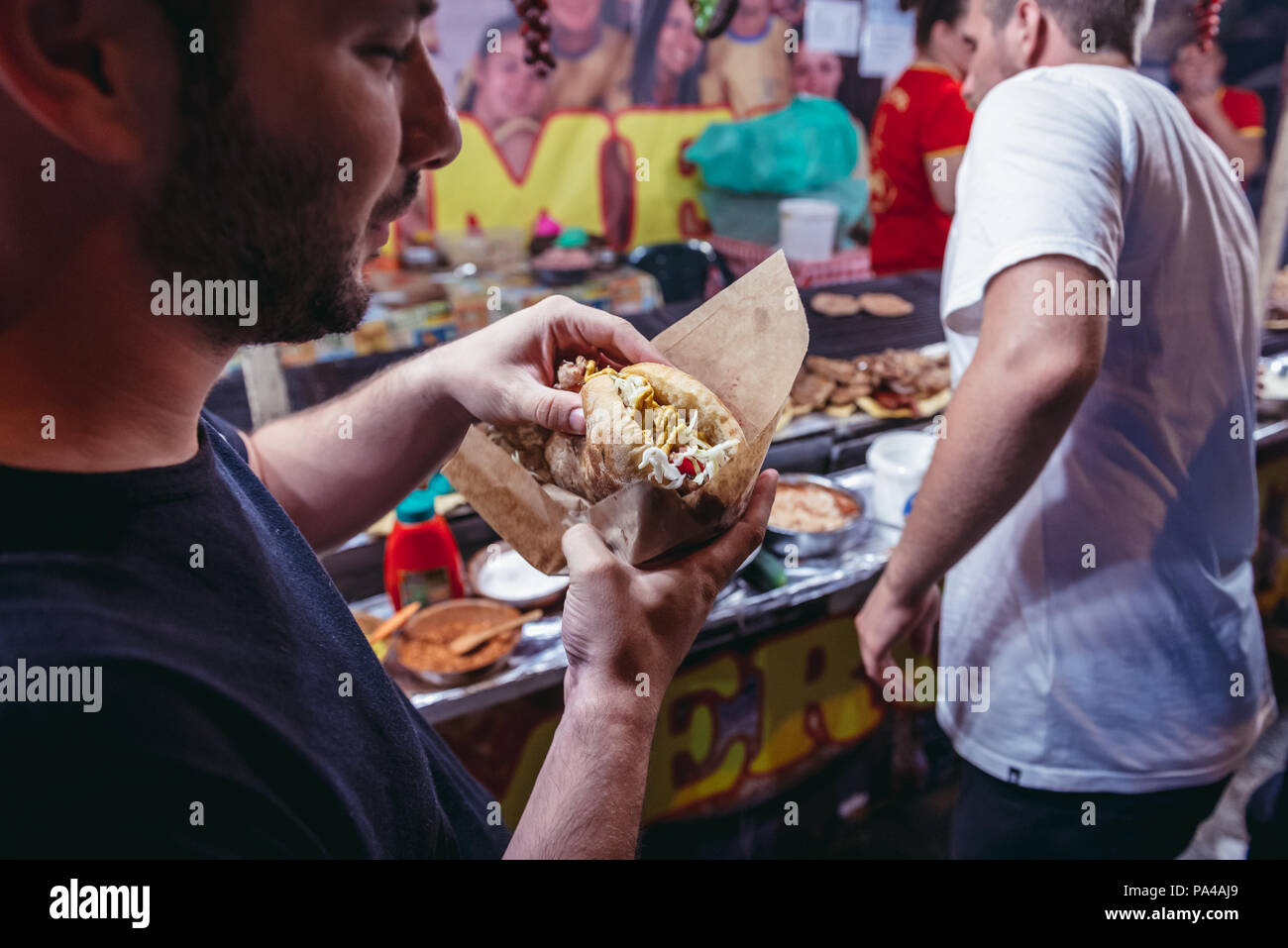 Food tent during famous annual Trumpet Festival in Guca village, Serbia ...