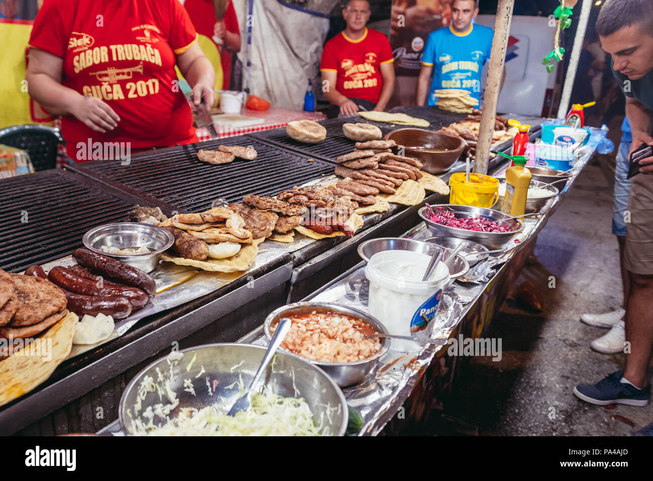 Food tent during famous annual Trumpet Festival in Guca village, Serbia ...