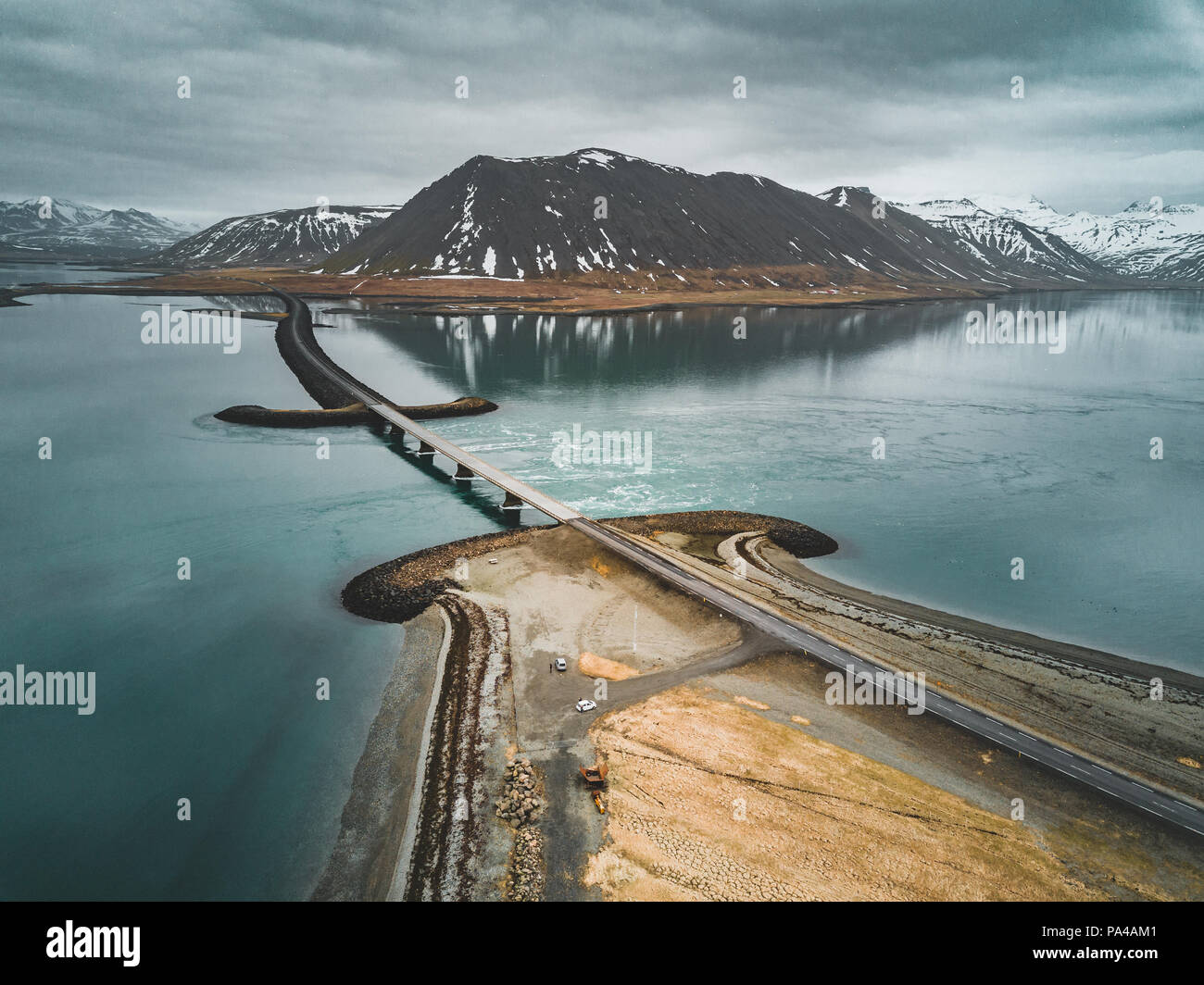 Aerial view of road 1 in iceland with bridge over the sea in ...