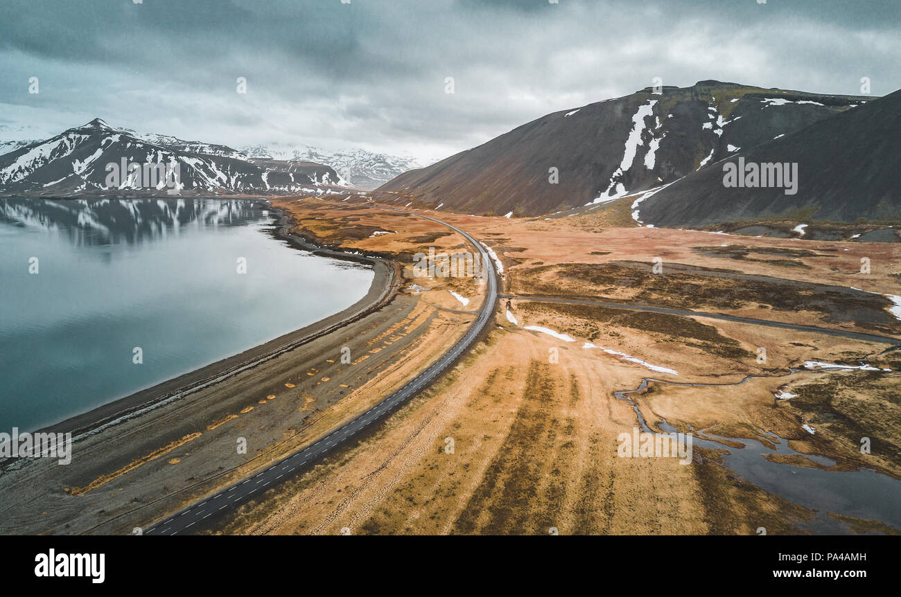 Aerial view of road 1 in iceland with bridge over the sea in ...