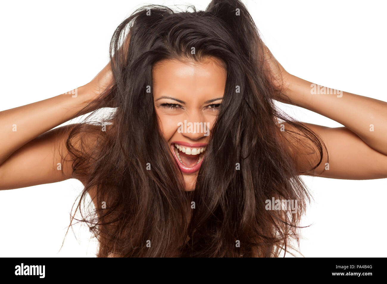 happy young latina with messy hair Stock Photo - Alamy