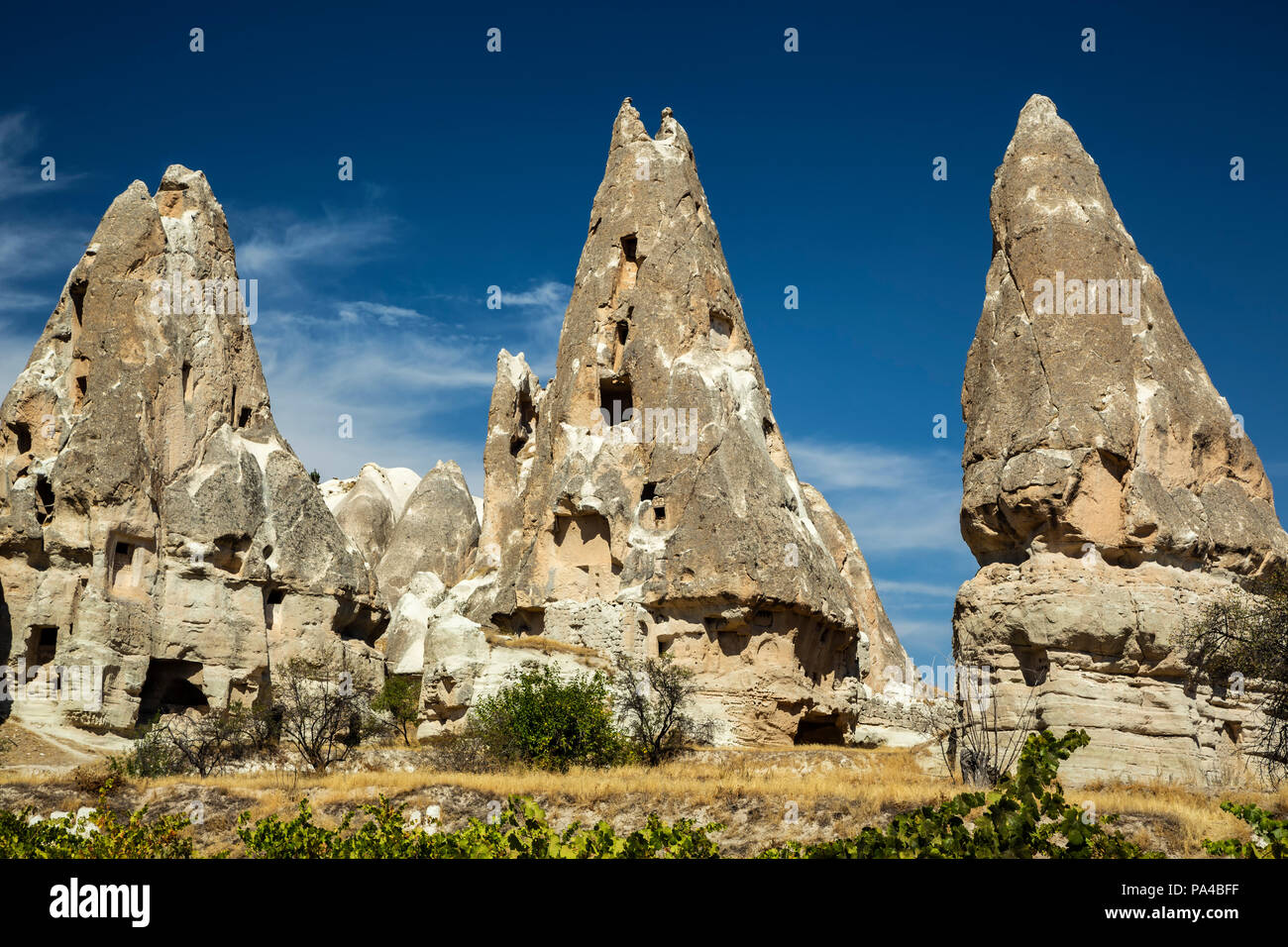 Dwellings in fairy chimneys, Goreme, Cappadocia, Turkey Stock Photo - Alamy