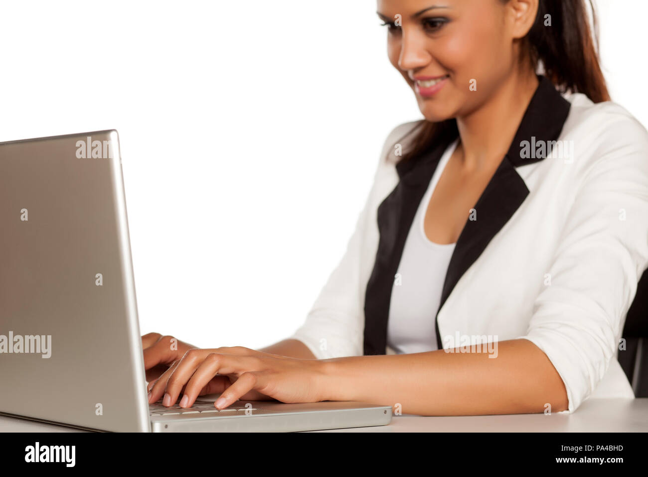 beautiful business woman working on her laptop Stock Photo - Alamy