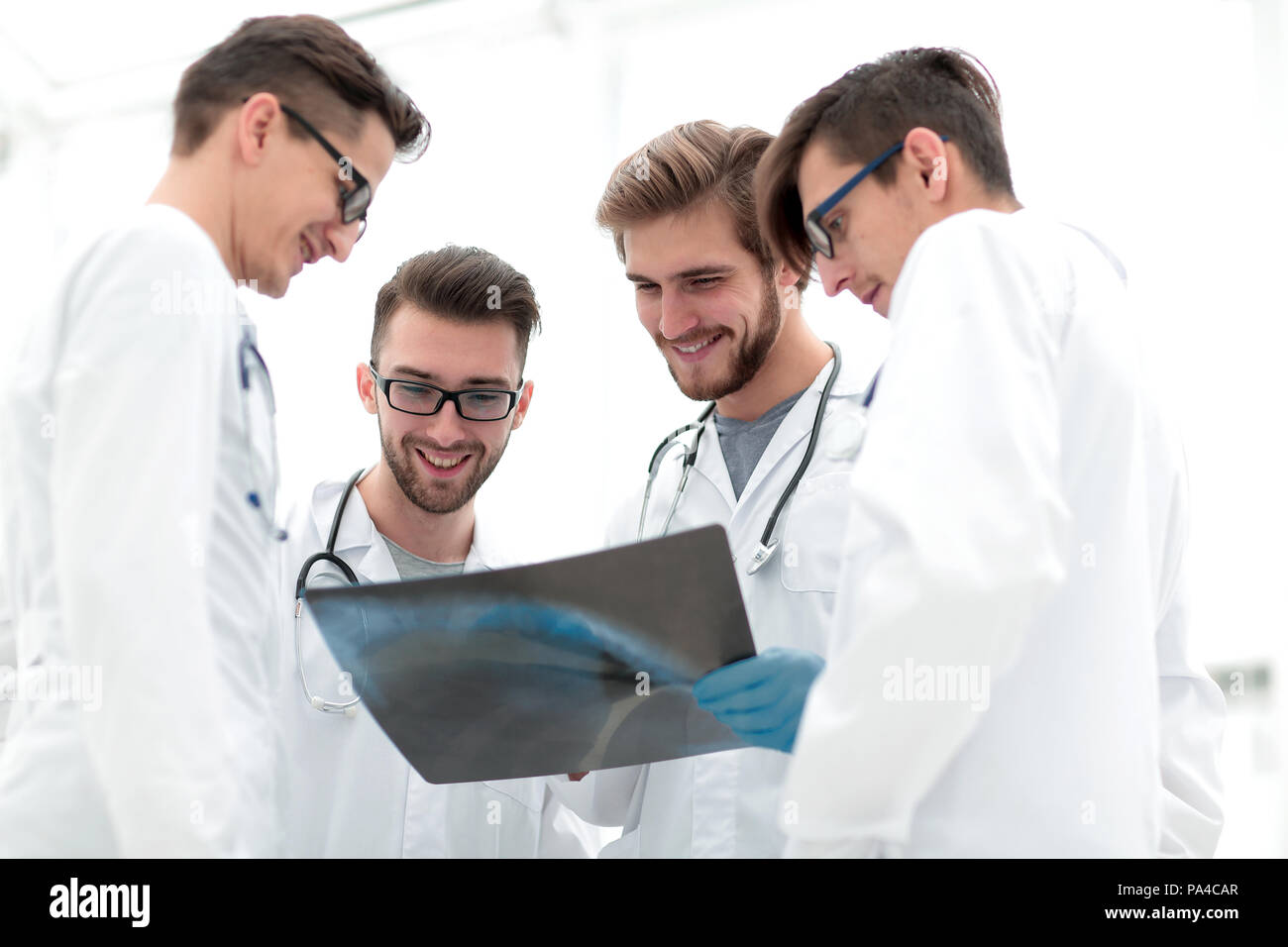 group of radiologists discussing x-ray Stock Photo - Alamy