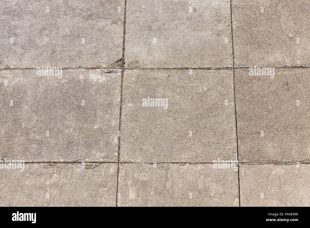 square concrete slabs, from which the wall of a multi-storey building ...