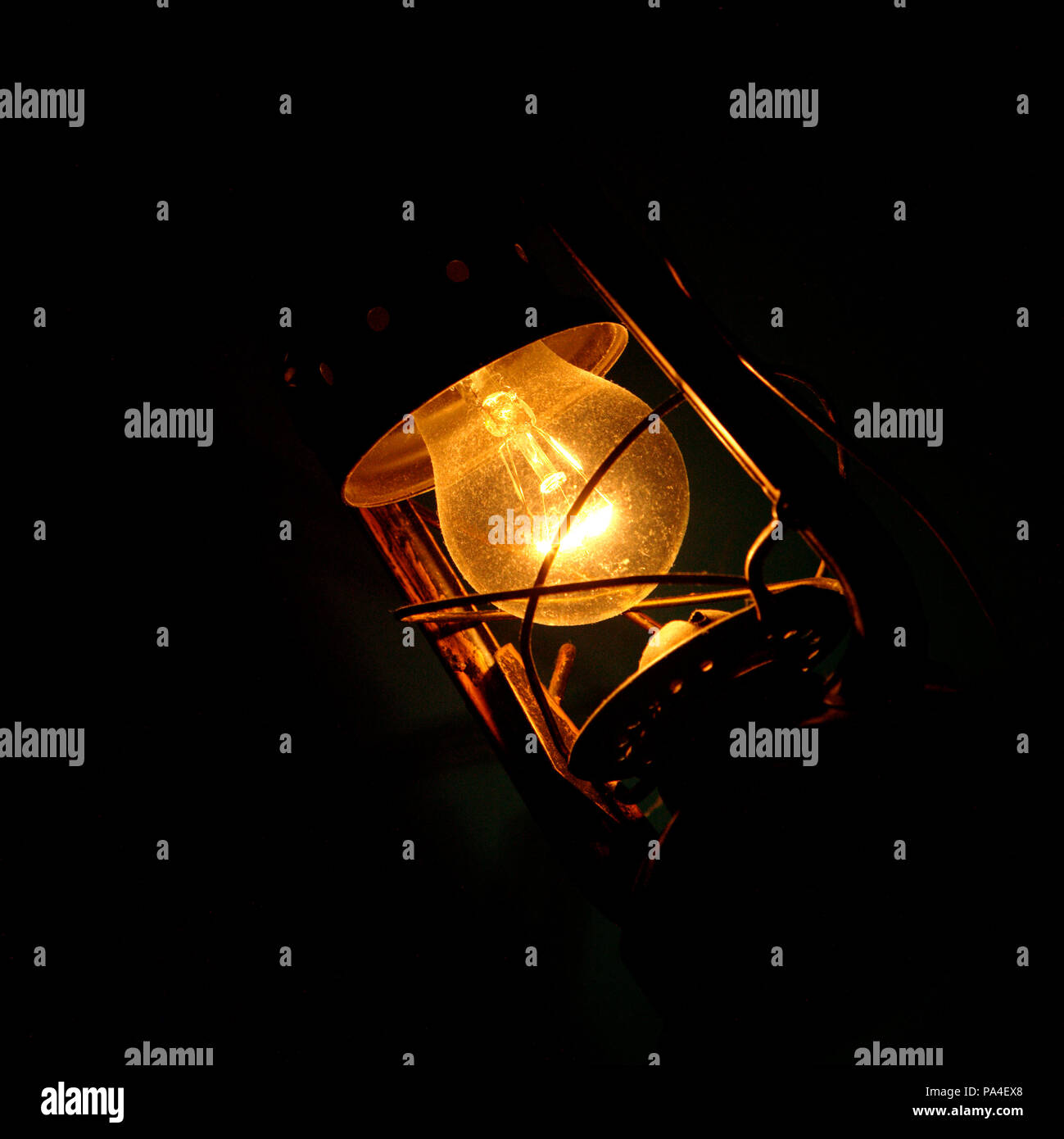 Electric bulb lantern in the dark Stock Photo - Alamy