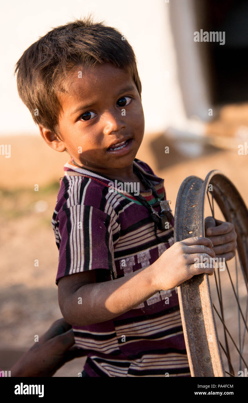 A local indian boy living in Kanha village near the Kanha National Park ...