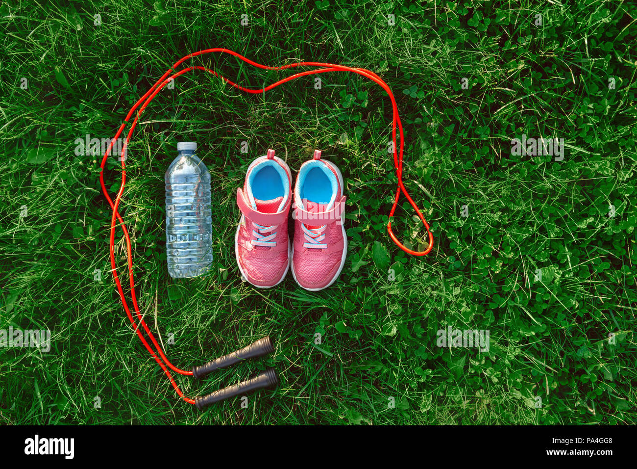 Child pink skipping rope hi-res stock photography and images - Alamy