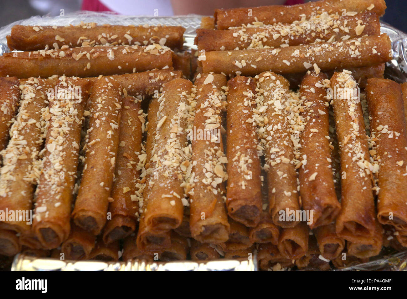 Almond sweet cigar pastries Stock Photo - Alamy