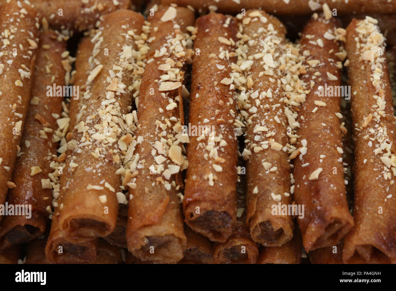 Almond sweet cigar pastries Stock Photo - Alamy