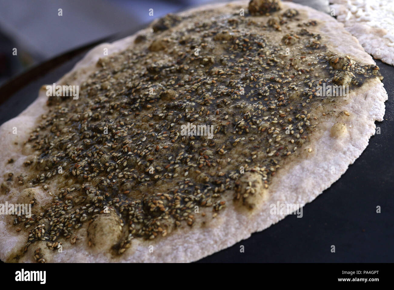 Mankousheh, a Lebanese flatbread made with thyme, oil, spices and ...