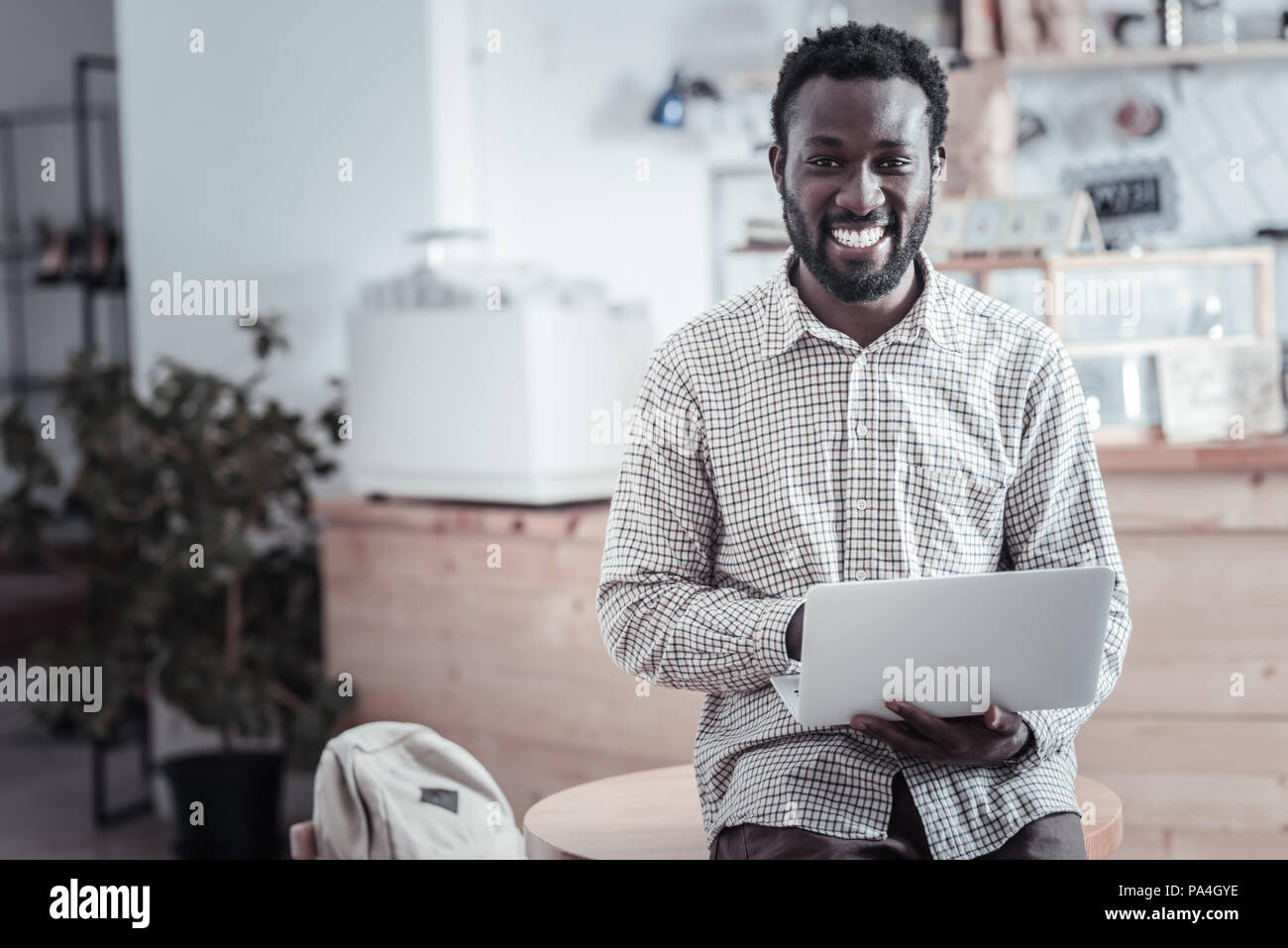 Happy cheerful man looking at you Stock Photo - Alamy