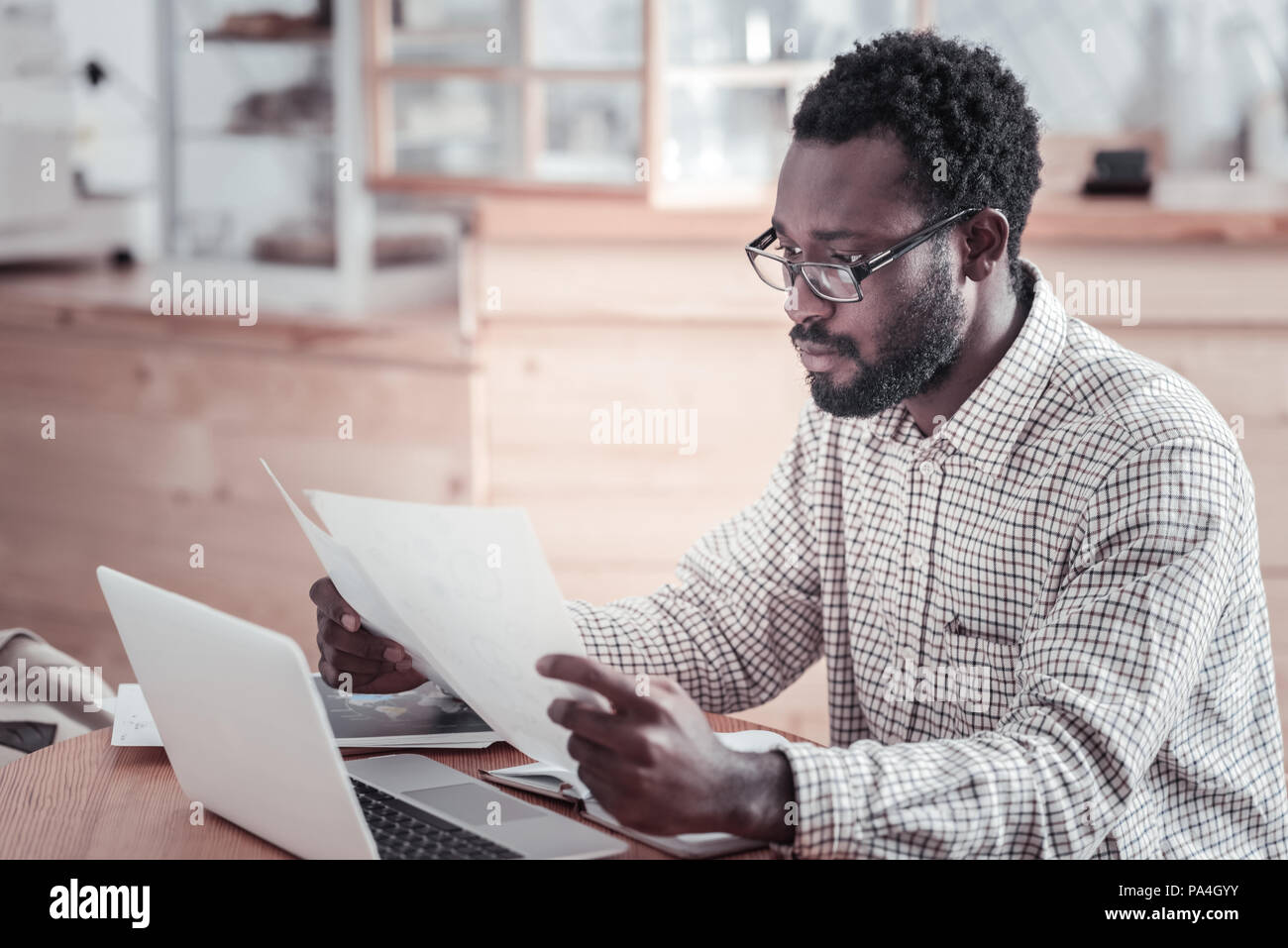 Man reading documents hi-res stock photography and images - Alamy