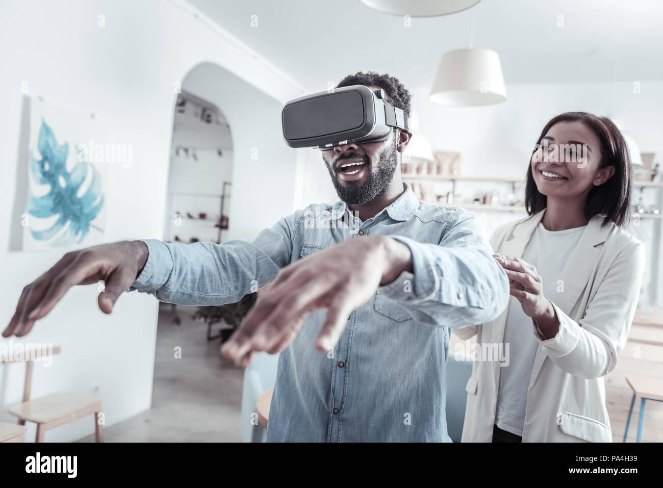 Nice joyful man being in a new dimension Stock Photo - Alamy