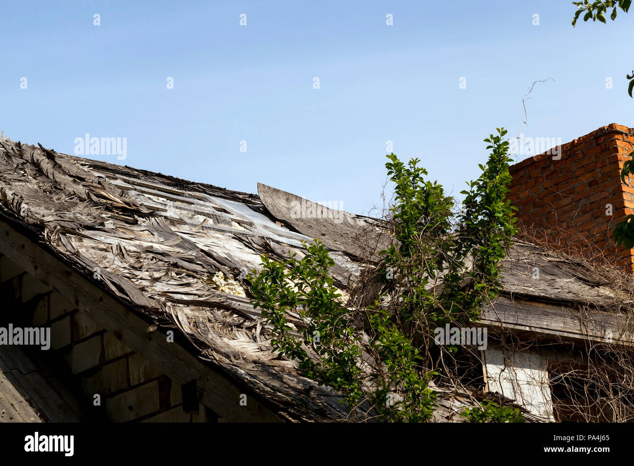 part of the roof of an old building that is collapsing and needs urgent ...
