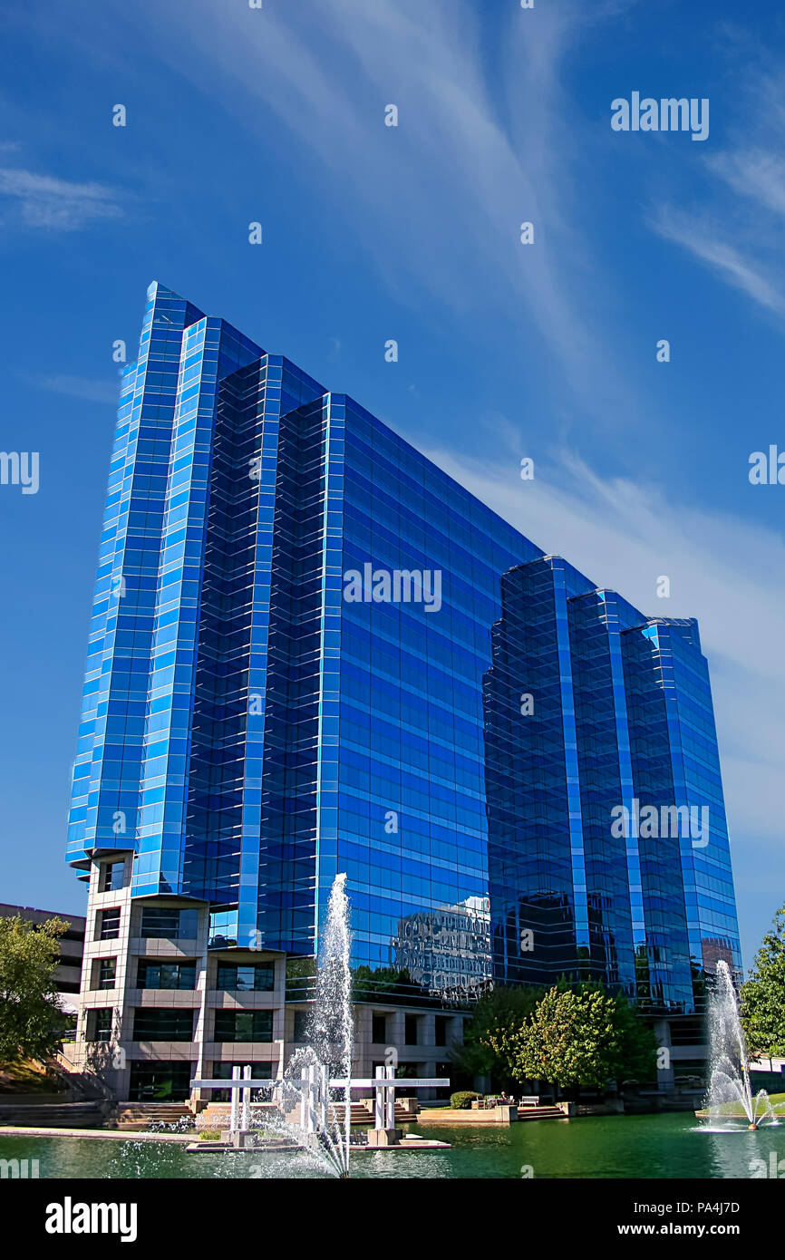 Blue Glass Building on Lake Stock Photo - Alamy