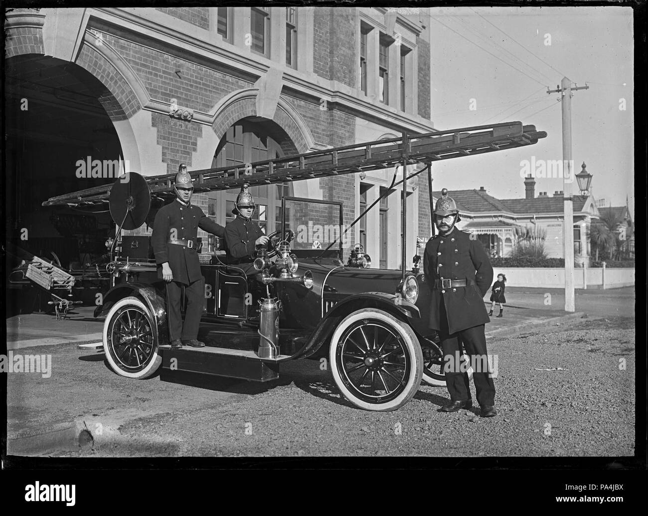 83 Firemen and a fire engine outside Petone Fire Station ATLIB 140840 ...