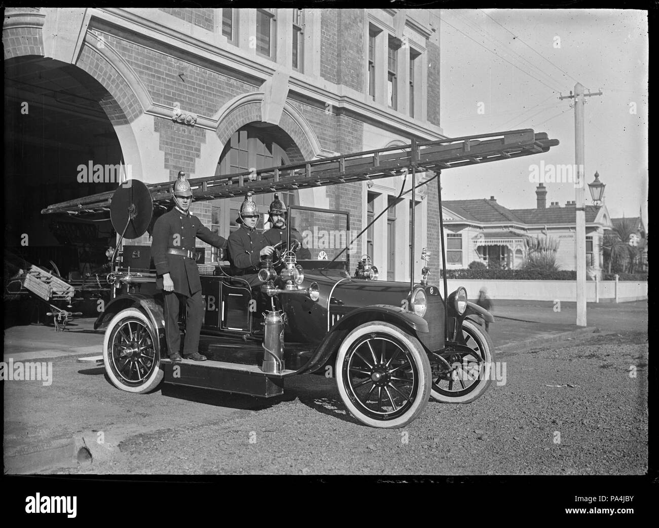 83 Firemen and a fire engine outside Petone Fire Station ATLIB 286451 ...
