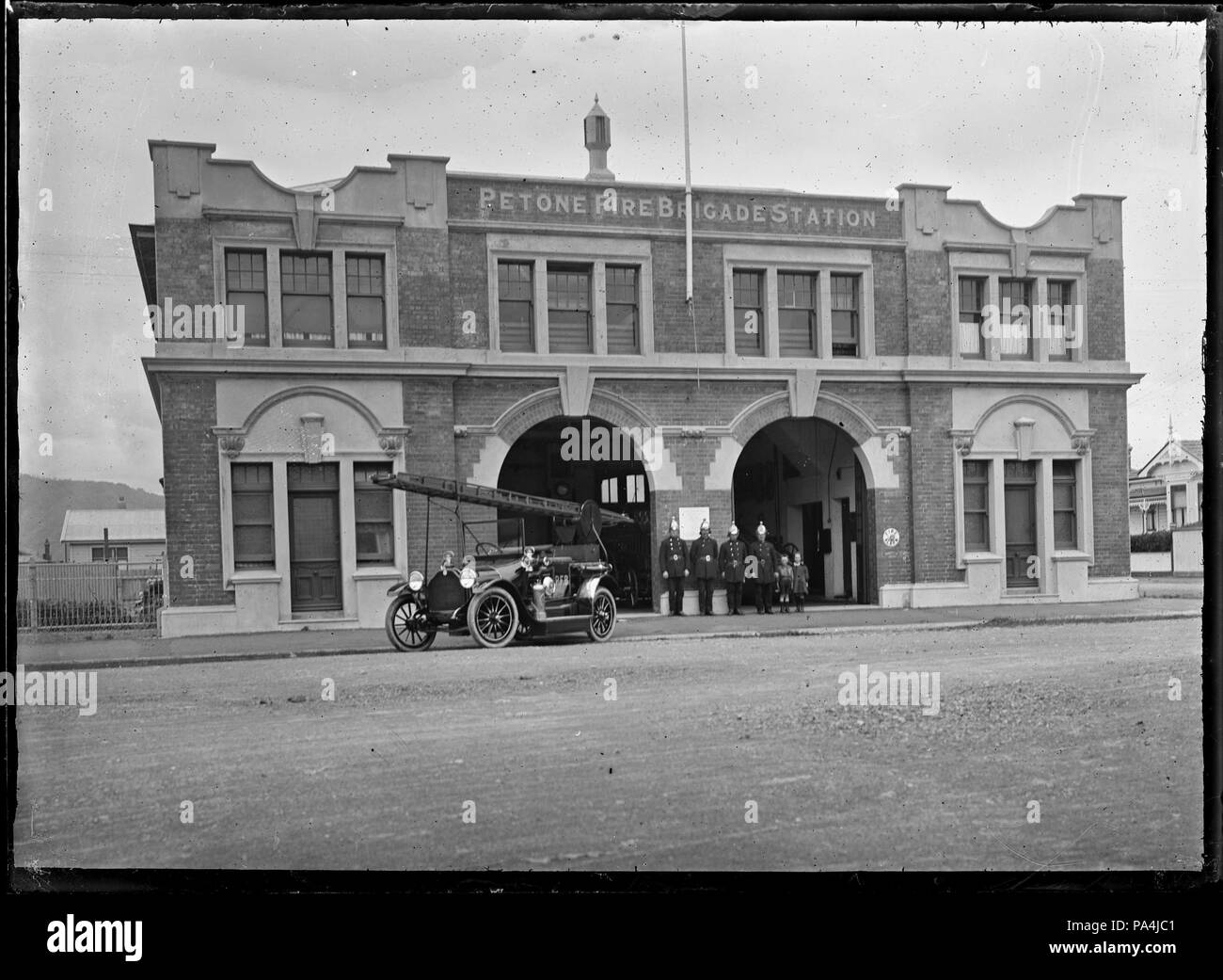 Fire engine outside fire station Black and White Stock Photos & Images ...