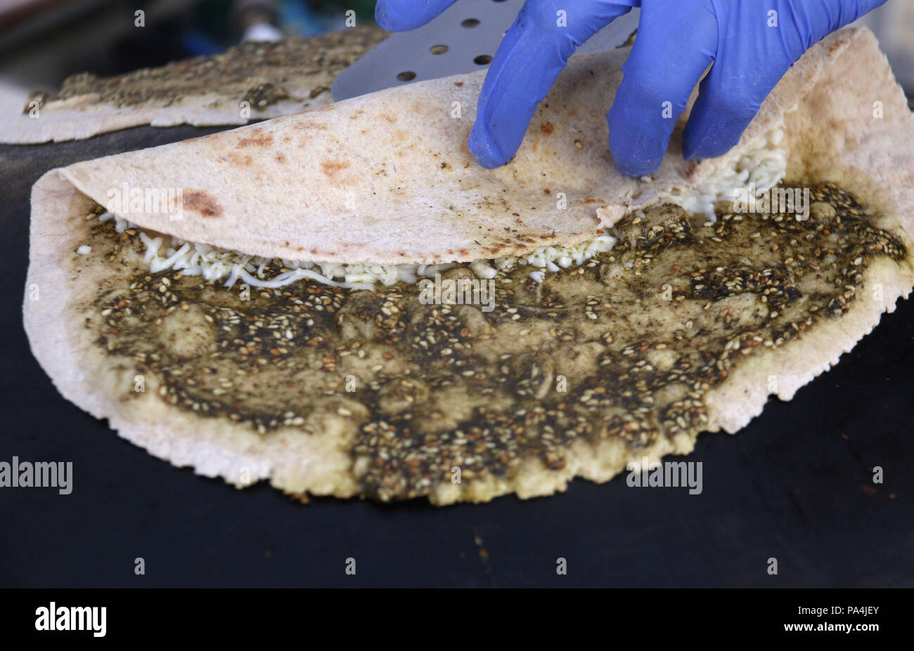 Mankousheh, a Lebanese flatbread made with thyme, oil, spices and ...