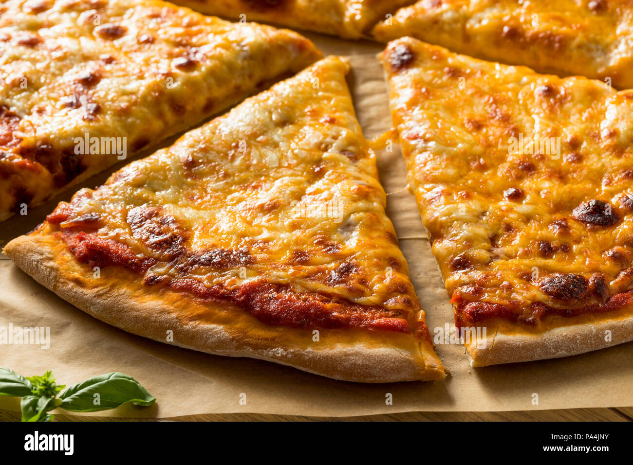Homemade Greasy New York Cheese Pizza Ready to Eat Stock Photo - Alamy