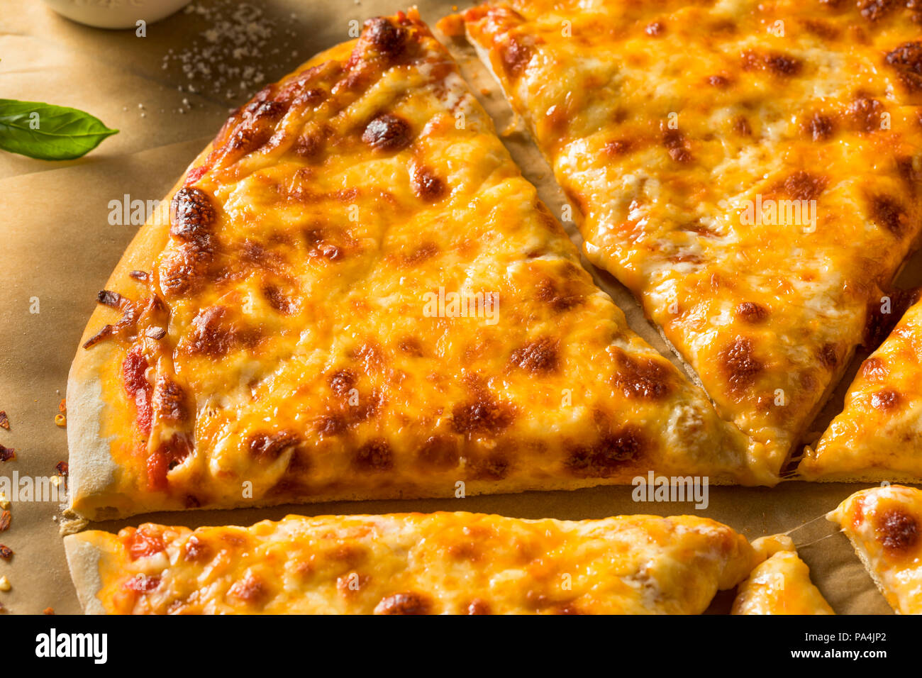 Homemade Greasy New York Cheese Pizza Ready to Eat Stock Photo - Alamy
