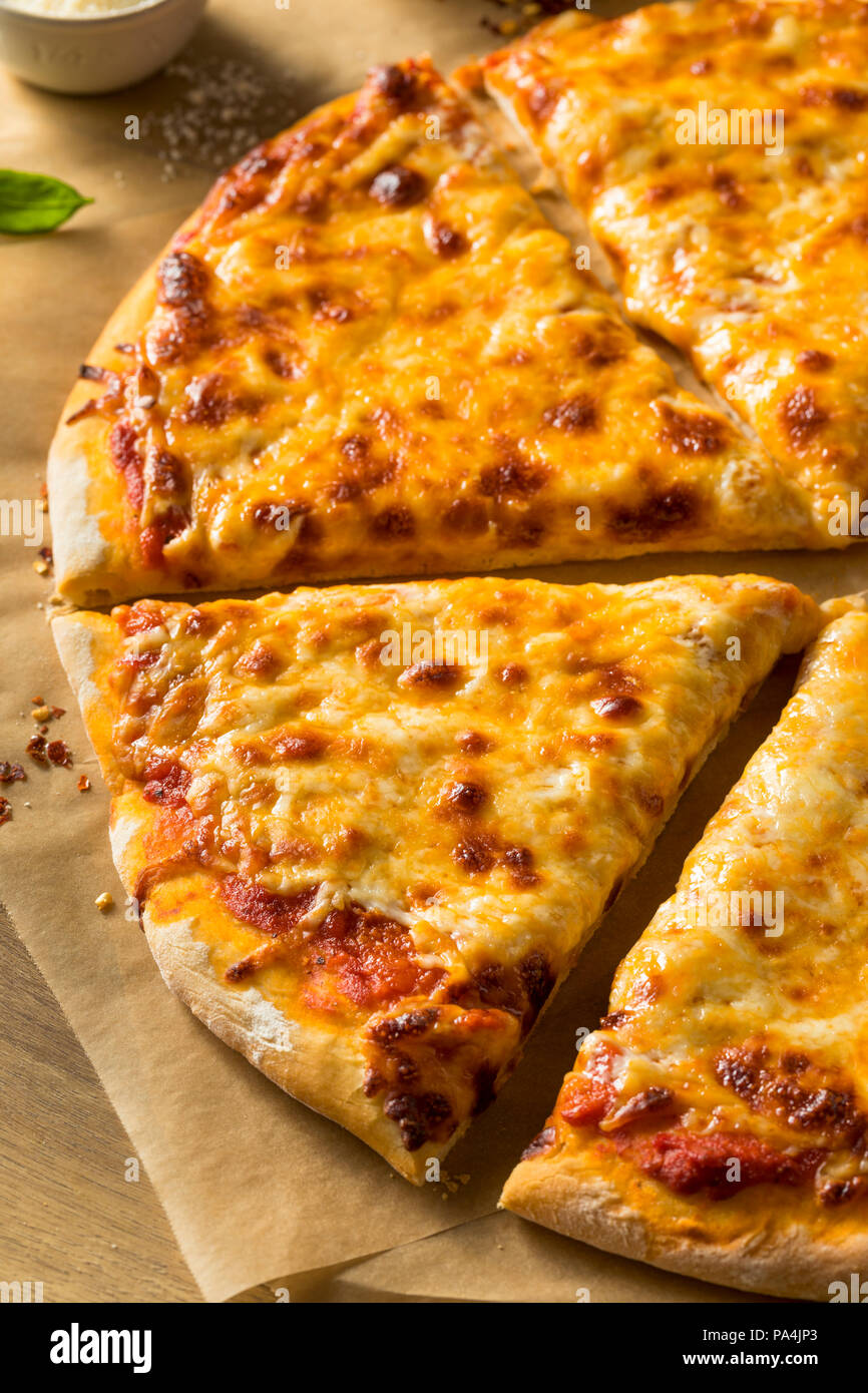 Homemade Greasy New York Cheese Pizza Ready to Eat Stock Photo - Alamy