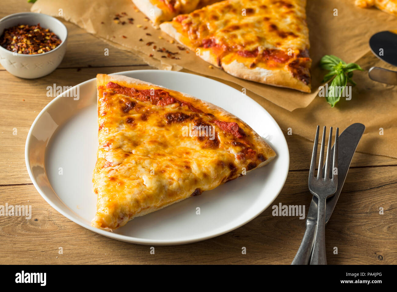 Homemade Greasy New York Cheese Pizza Ready to Eat Stock Photo - Alamy