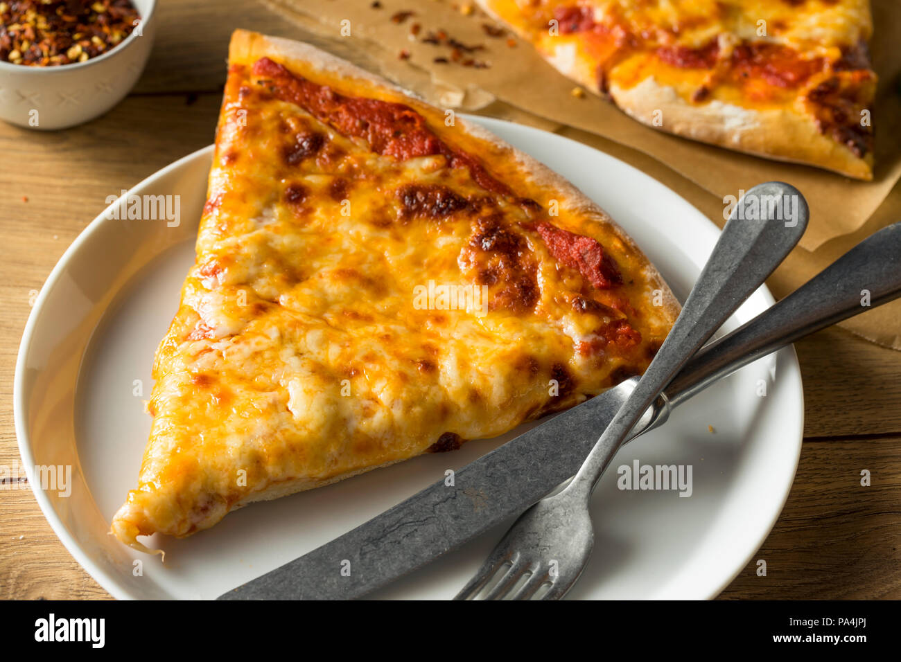 Homemade Greasy New York Cheese Pizza Ready to Eat Stock Photo - Alamy
