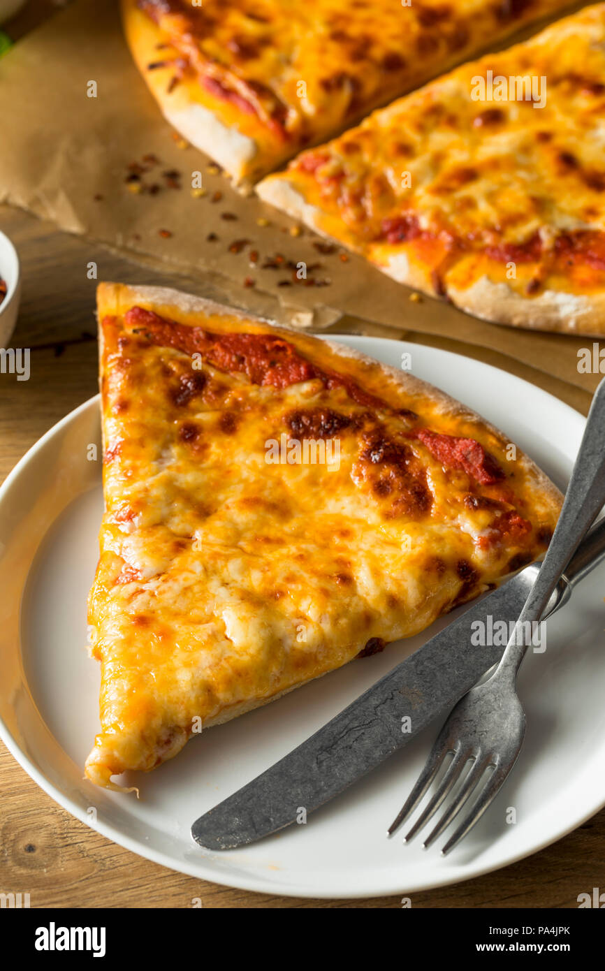 Homemade Greasy New York Cheese Pizza Ready to Eat Stock Photo - Alamy
