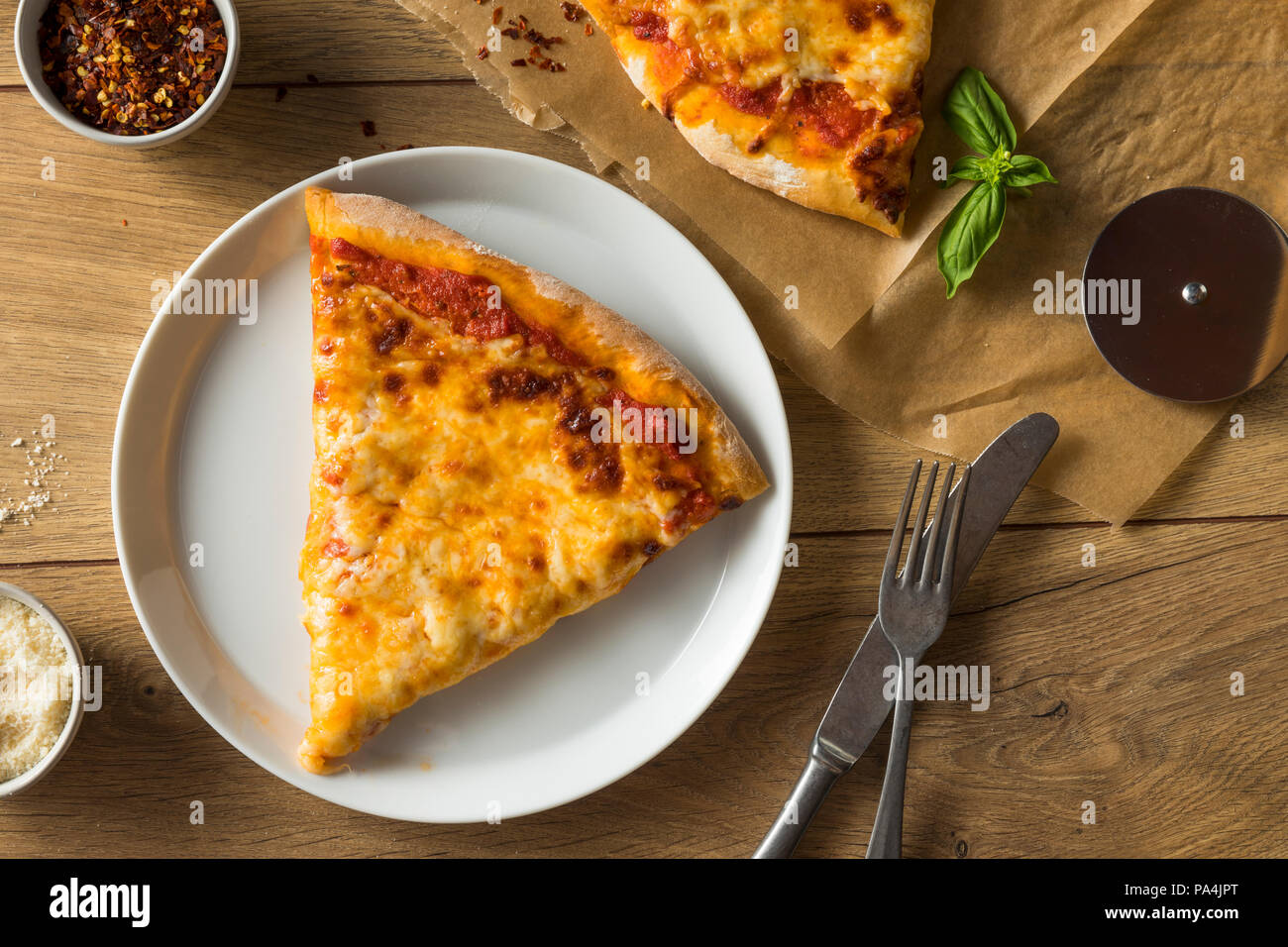 Homemade Greasy New York Cheese Pizza Ready to Eat Stock Photo - Alamy
