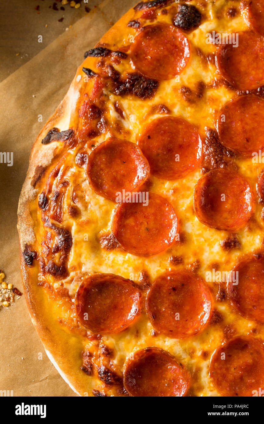 Homemade Greasy Pepperoni New York Pizza Ready to Eat Stock Photo - Alamy