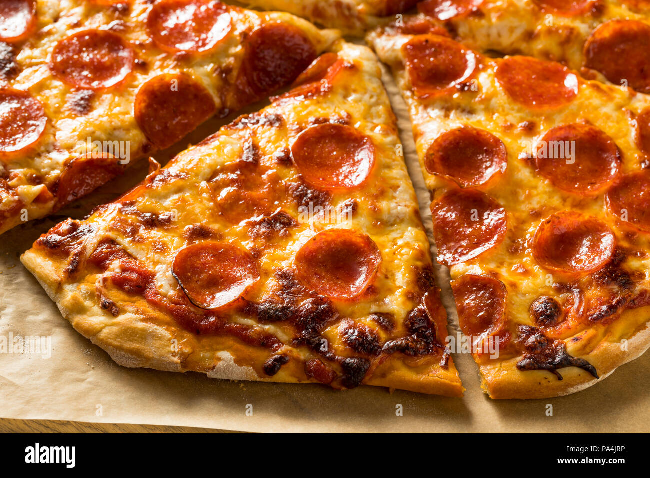 Homemade Greasy Pepperoni New York Pizza Ready to Eat Stock Photo - Alamy