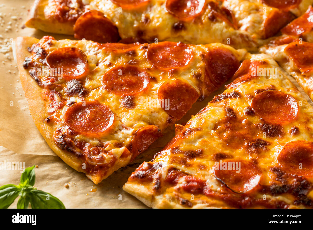 Homemade Greasy Pepperoni New York Pizza Ready to Eat Stock Photo - Alamy