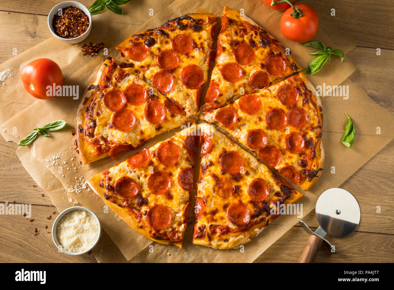 Homemade Greasy Pepperoni New York Pizza Ready to Eat Stock Photo - Alamy