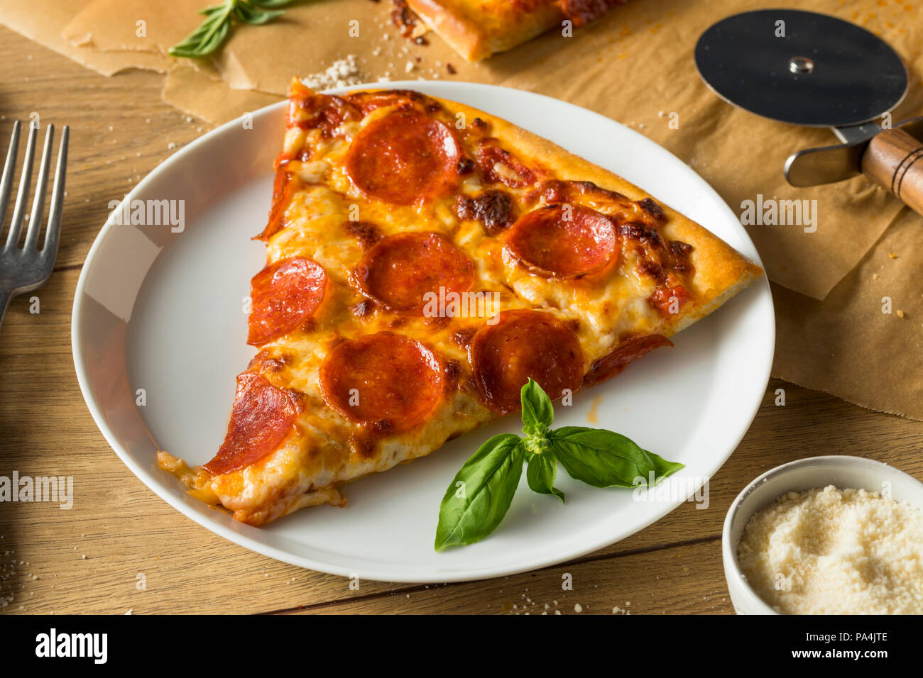 Homemade Greasy Pepperoni New York Pizza Ready to Eat Stock Photo - Alamy