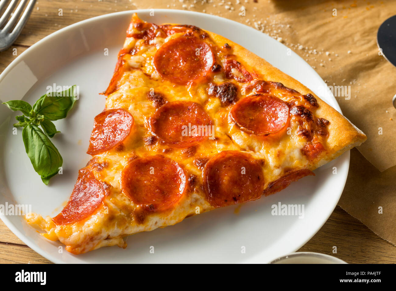Homemade Greasy Pepperoni New York Pizza Ready to Eat Stock Photo - Alamy
