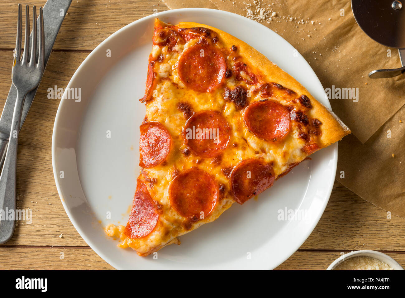 Homemade Greasy Pepperoni New York Pizza Ready to Eat Stock Photo - Alamy