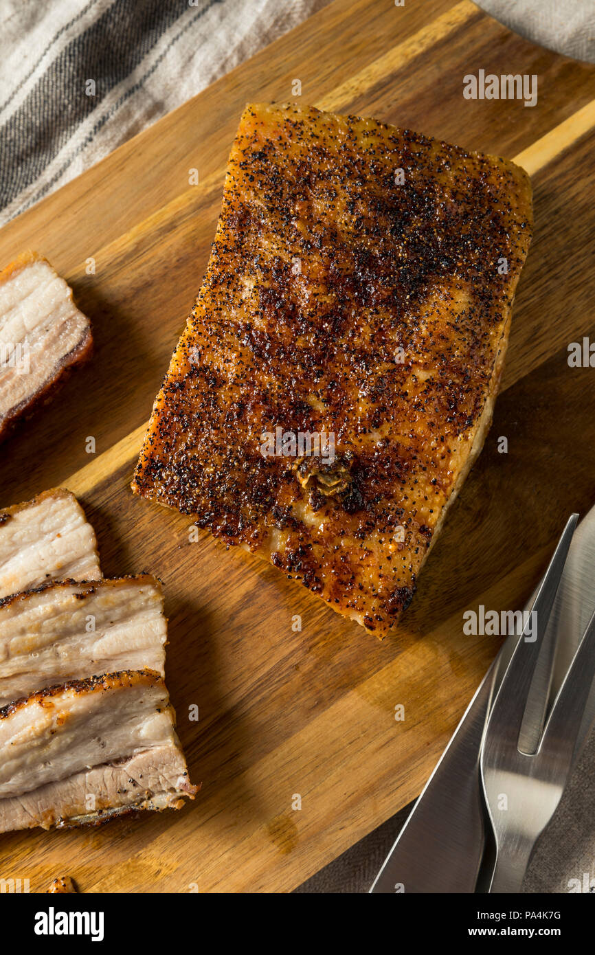 Roasted Organic Pork Belly Meat with Salt and Pepper Stock Photo - Alamy