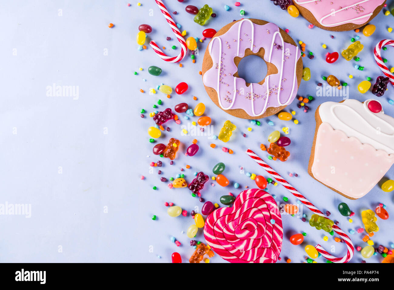 Sweets creative lay out, dessert concept with lollipops, jellies, candy ...