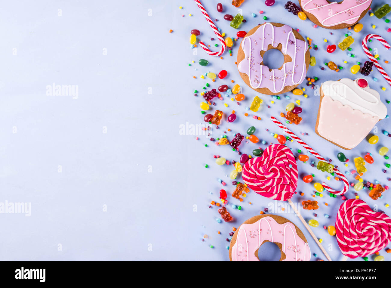 Sweets creative lay out, dessert concept with lollipops, jellies, candy ...