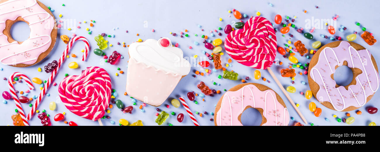 Sweets creative lay out, dessert concept with lollipops, jellies, candy ...