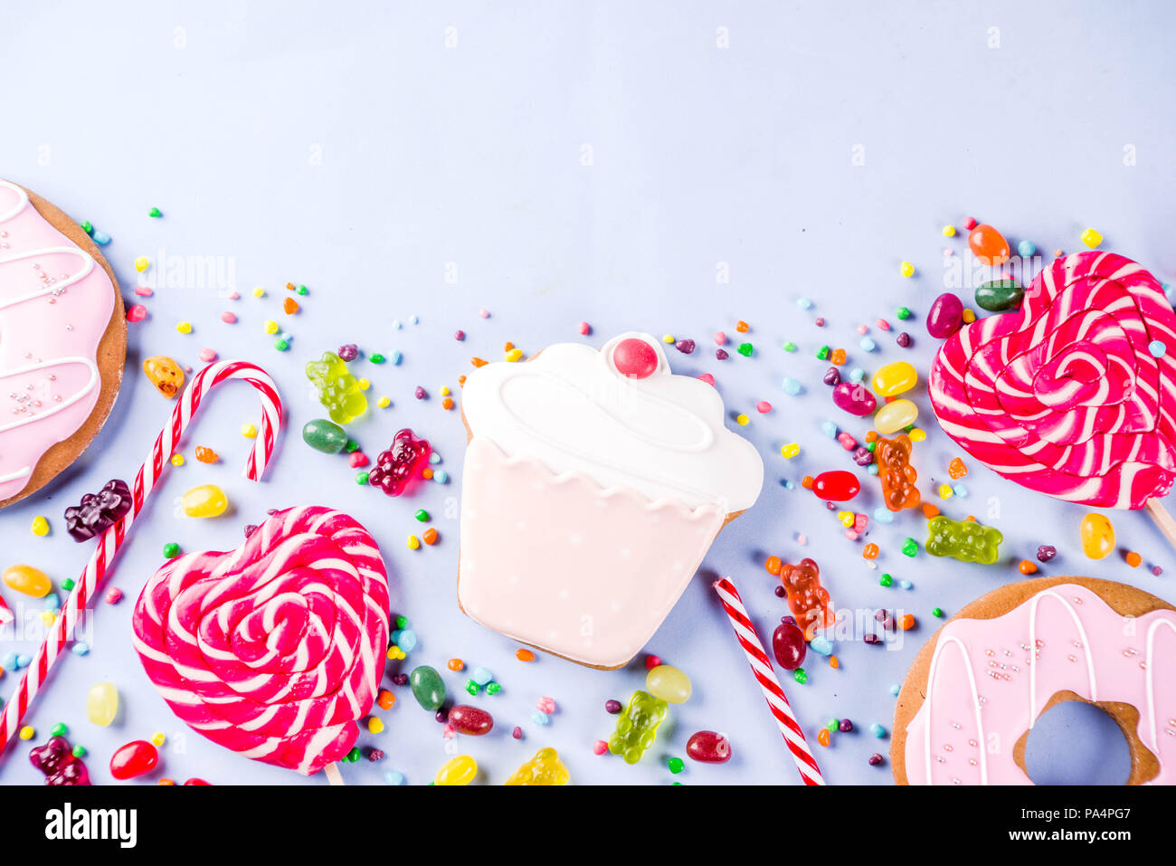 Sweets creative lay out, dessert concept with lollipops, jellies, candy ...