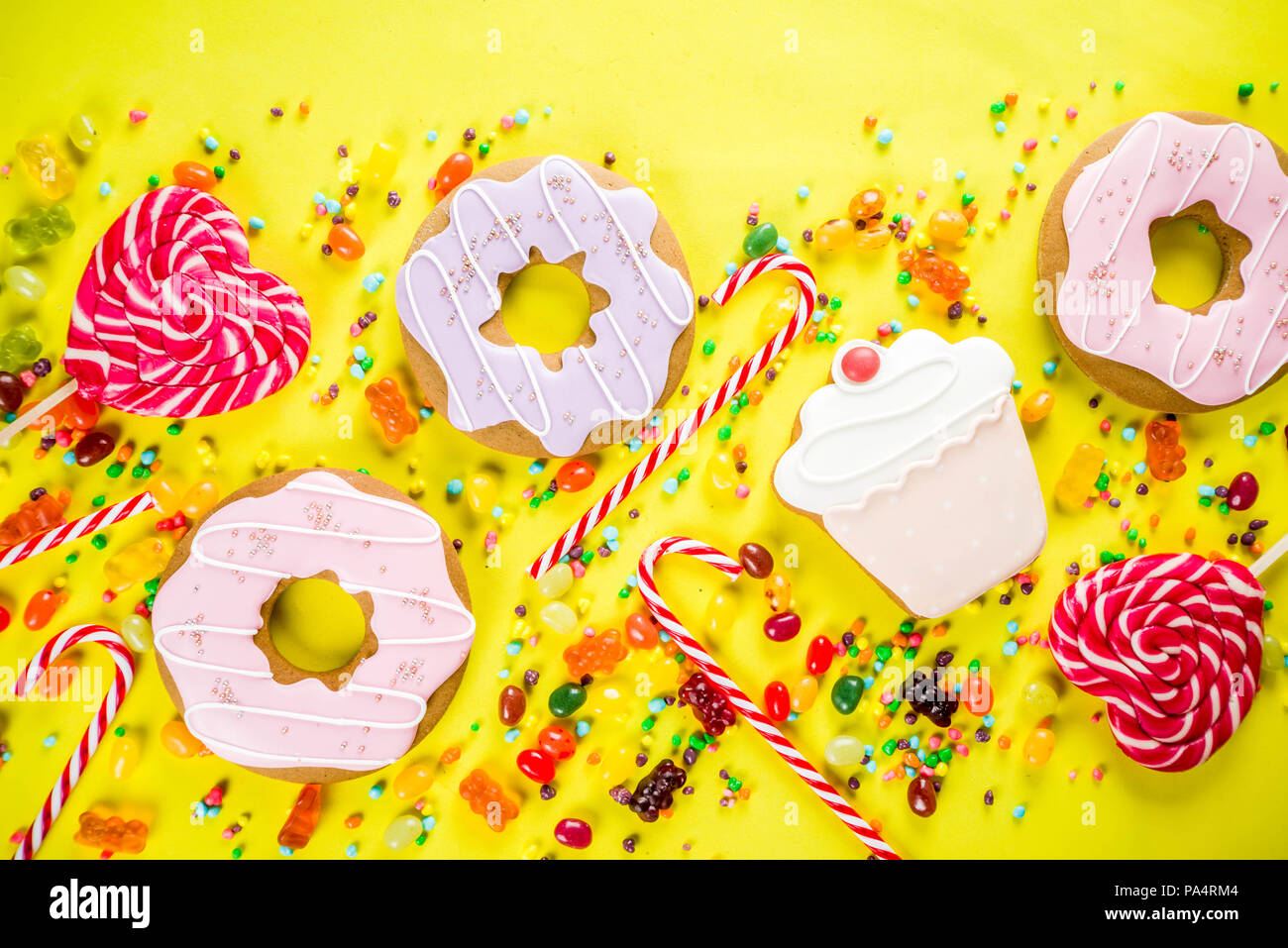 Sweets creative lay out, dessert concept with lollipops, jellies, candy ...