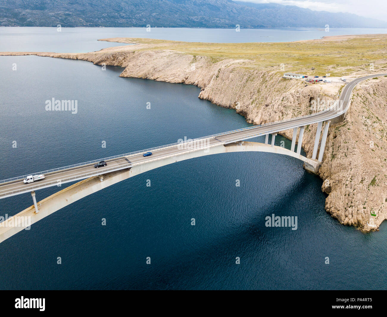 Aerial view of the bridge of the island of Pag, Croatia, road. Cliff ...