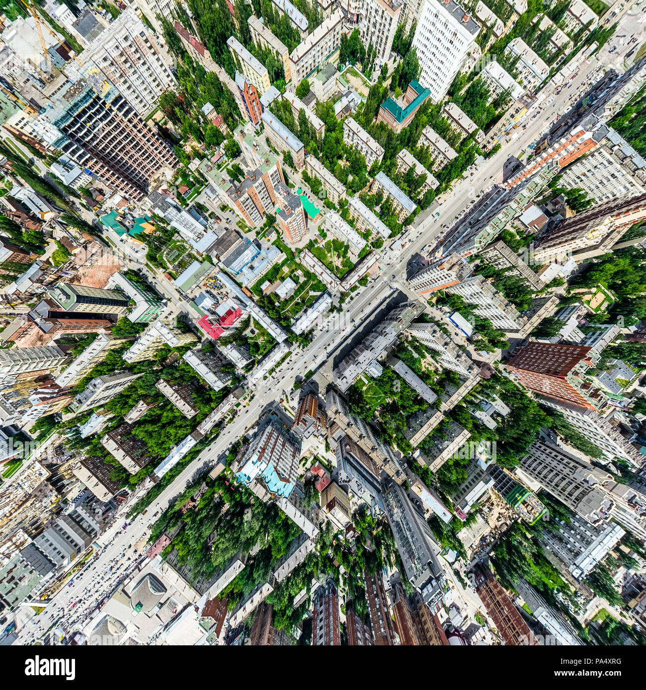 Aerial city view with crossroads and roads, houses, buildings, parks ...