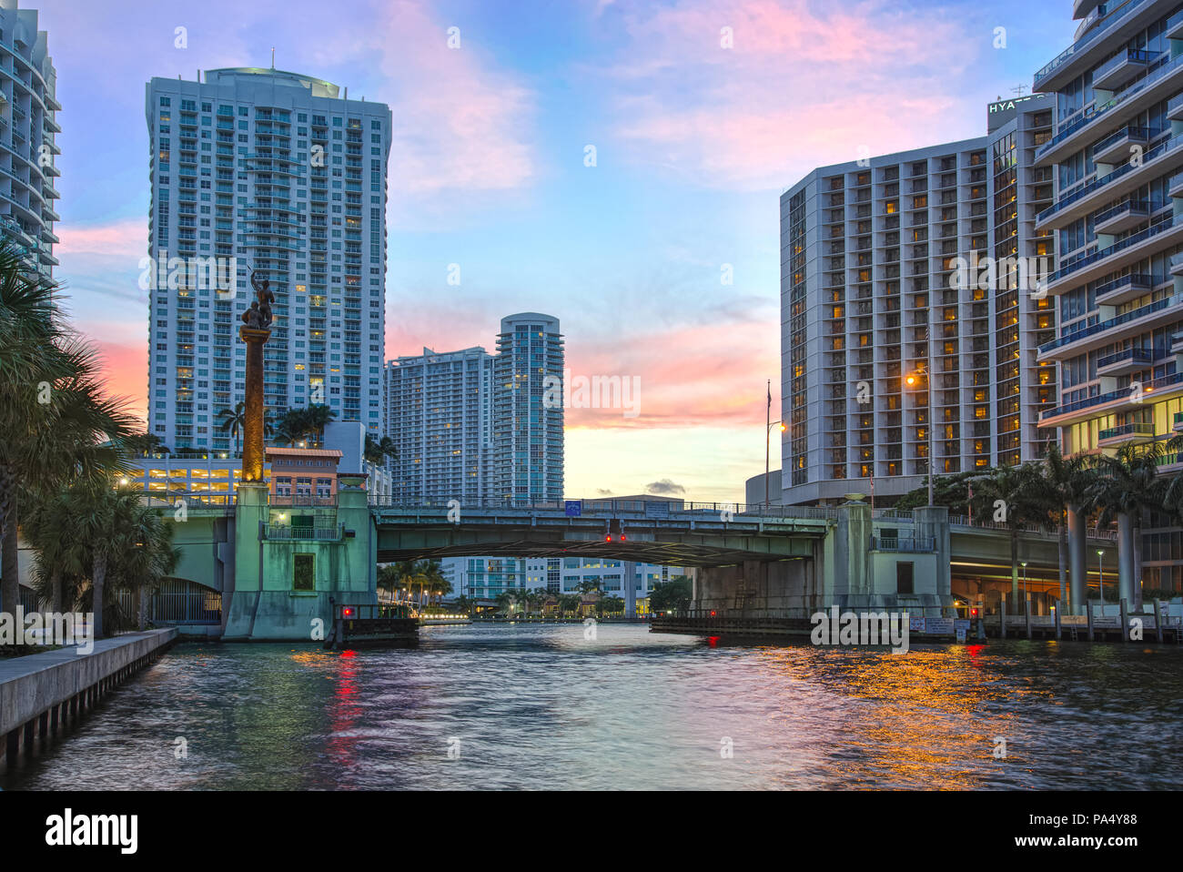 The Brickell Bridge over the Miami River during a sunset Stock Photo ...